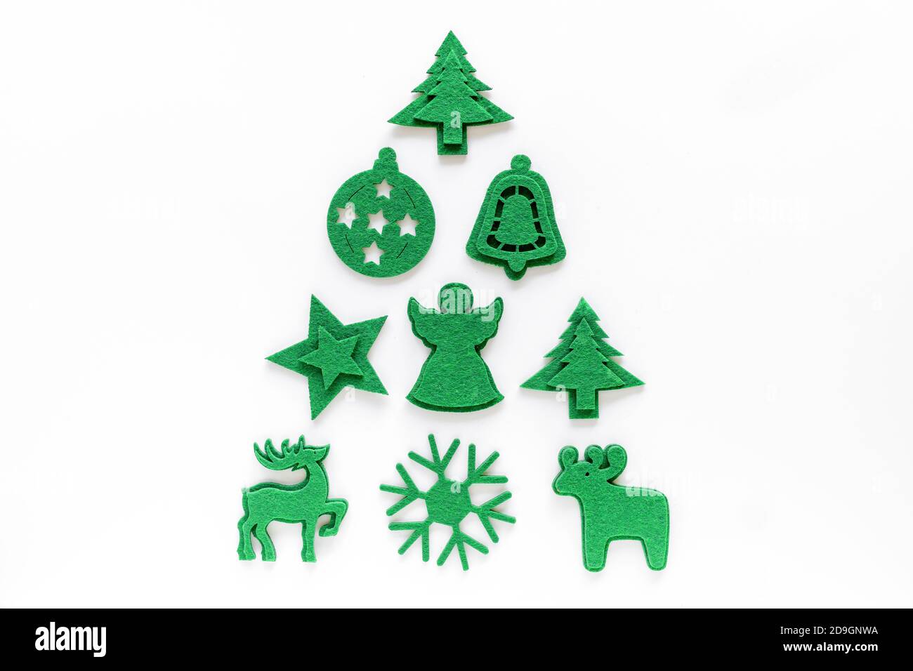 Creative christmas tree layout made from felt decorations. Flat lay ...