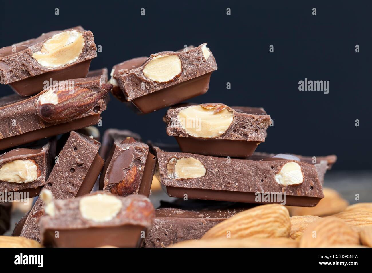 almonds and chocolate mixed in sweet chocolate Stock Photo - Alamy