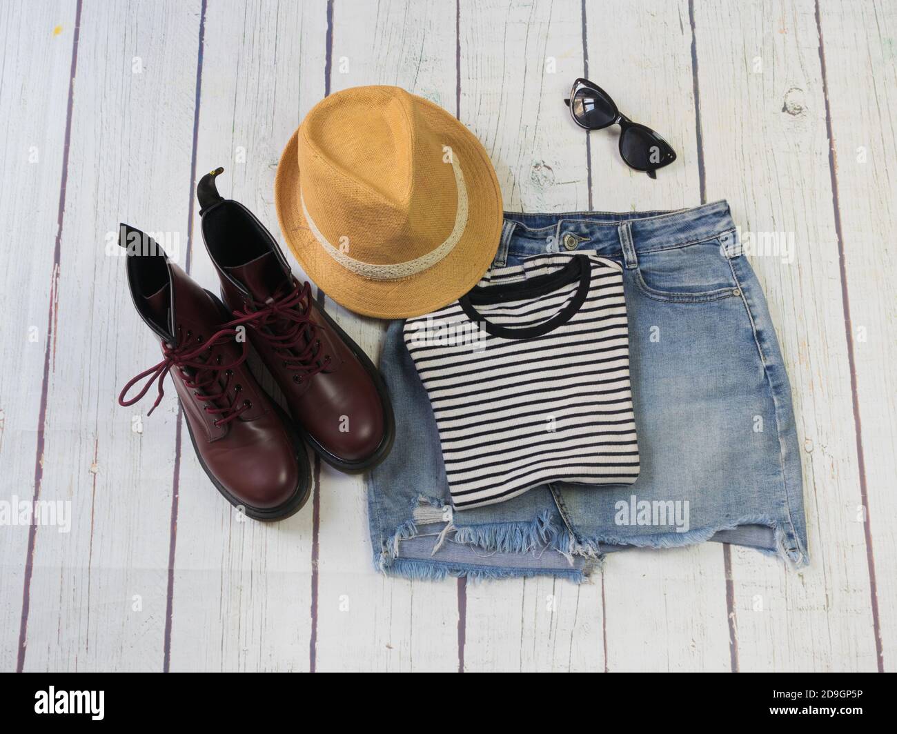 Still life of clothes with jeans, striped t-shirt, airplane ... Still ...