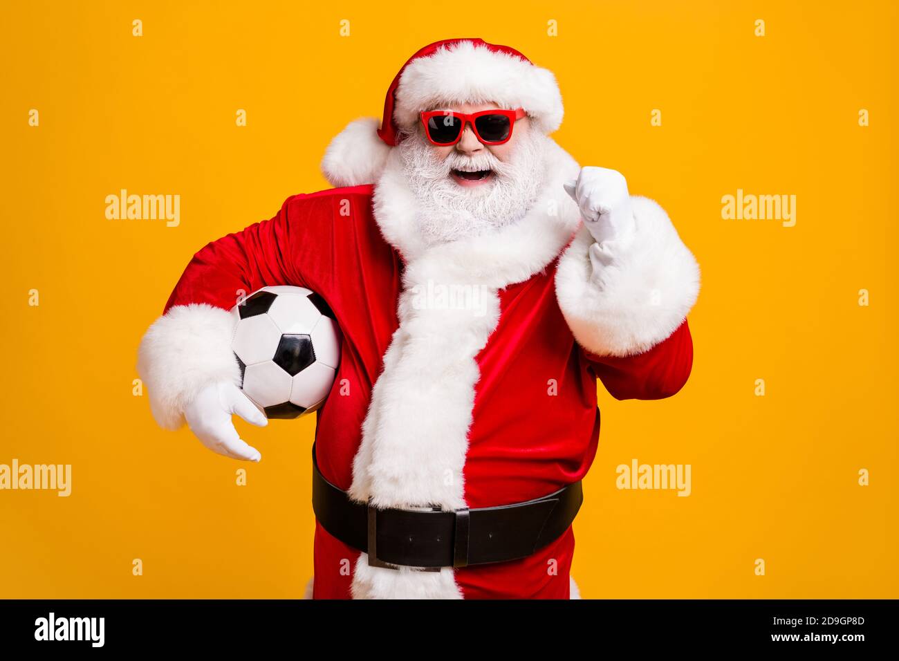 Portrait of his he nice attractive cheerful cheery Santa holding in ...