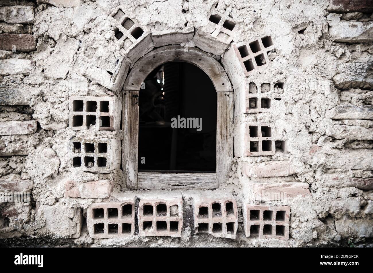 Old brick window of a medieval building Stock Photo - Alamy