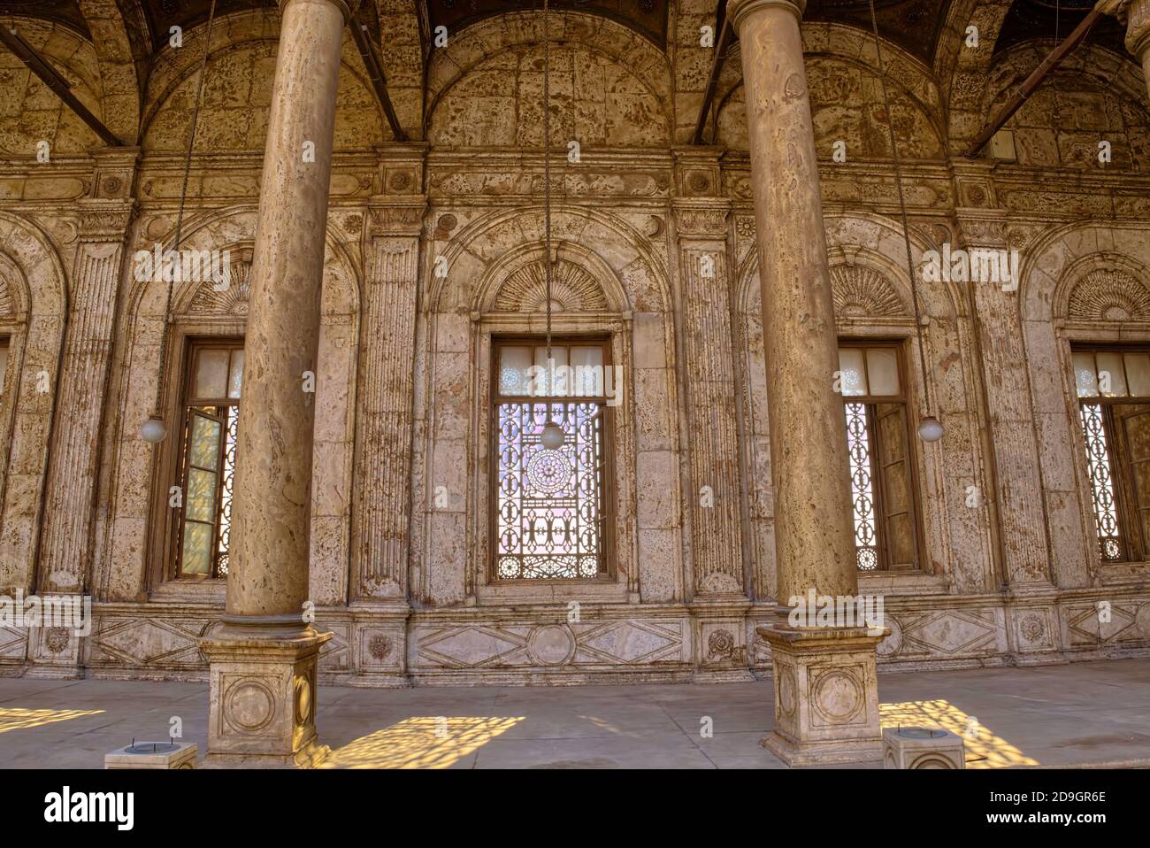 The walls and piers of the mosque are paneled with alabaster from Upper ...