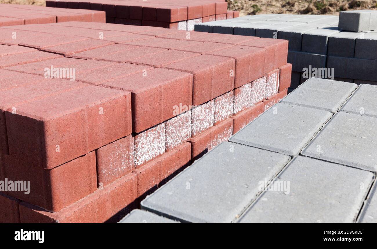 Packed on new wooden pallets, concrete tiles Stock Photo - Alamy