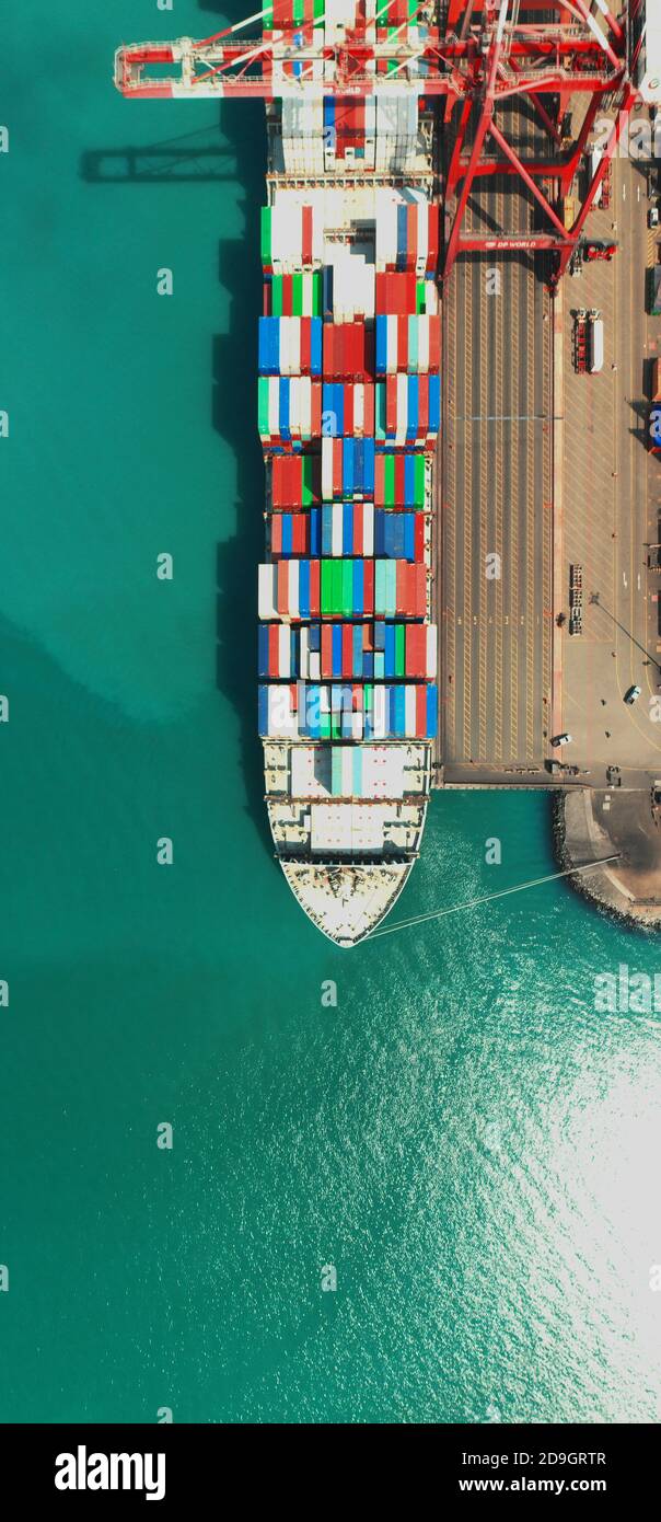 Aerial view container ship carrying container in import export business logistic and ...