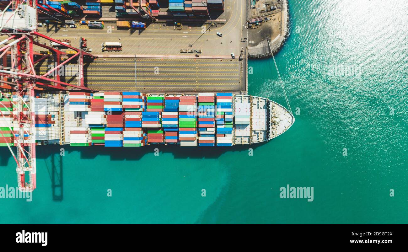 Aerial view container ship carrying container in import export business logistic and ...