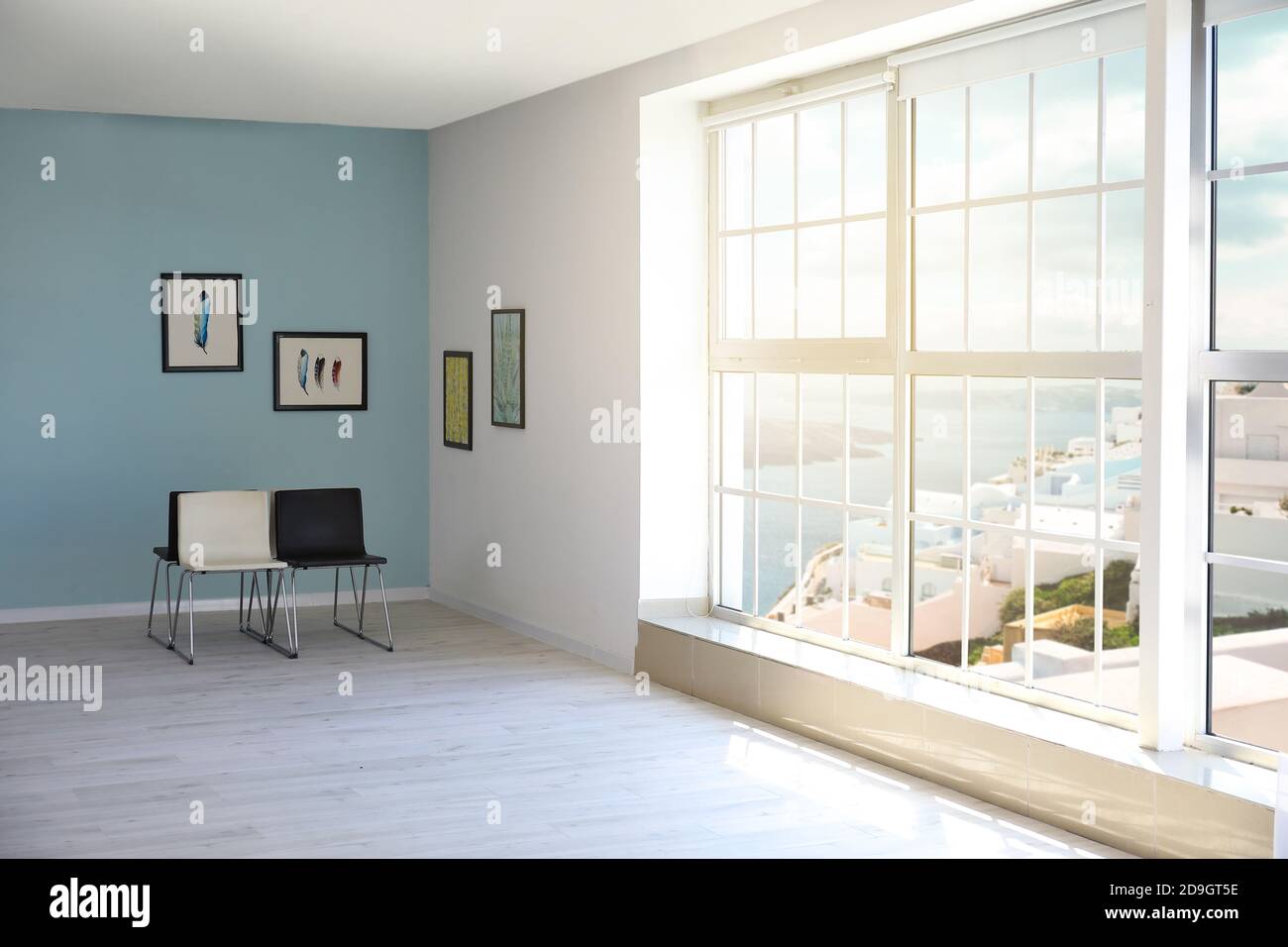 Interior of modern art gallery with big window Stock Photo - Alamy