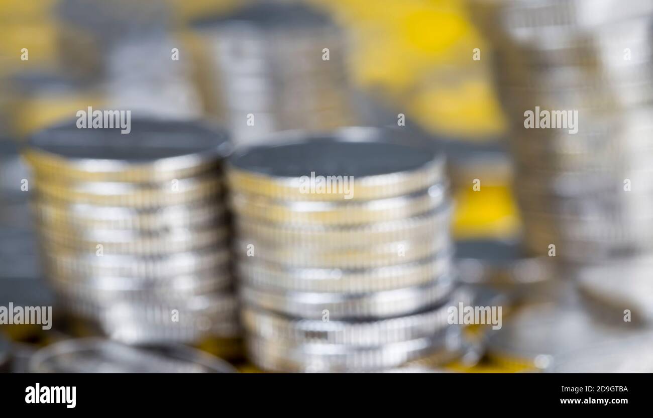 many round metal coins of silver color Stock Photo - Alamy