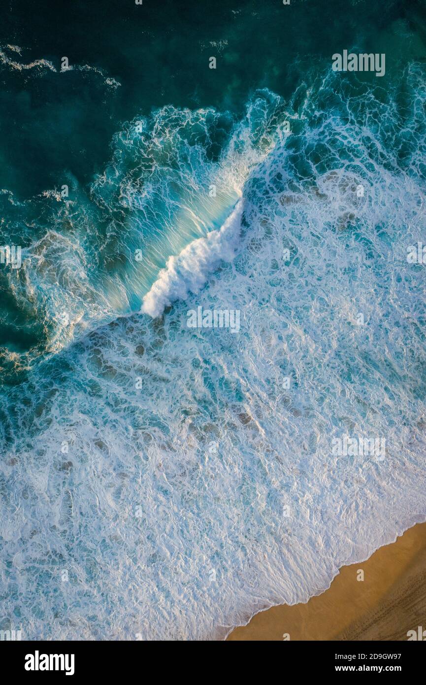 Aerial overhead surf pounding shore hi-res stock photography and images ...