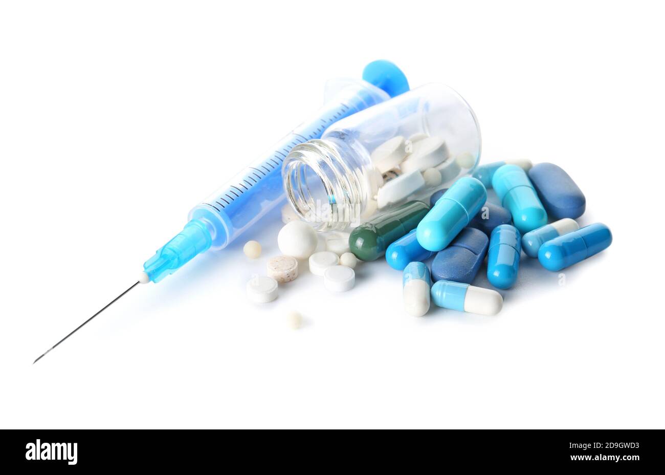 Pills and syringe for injection on white background Stock Photo - Alamy
