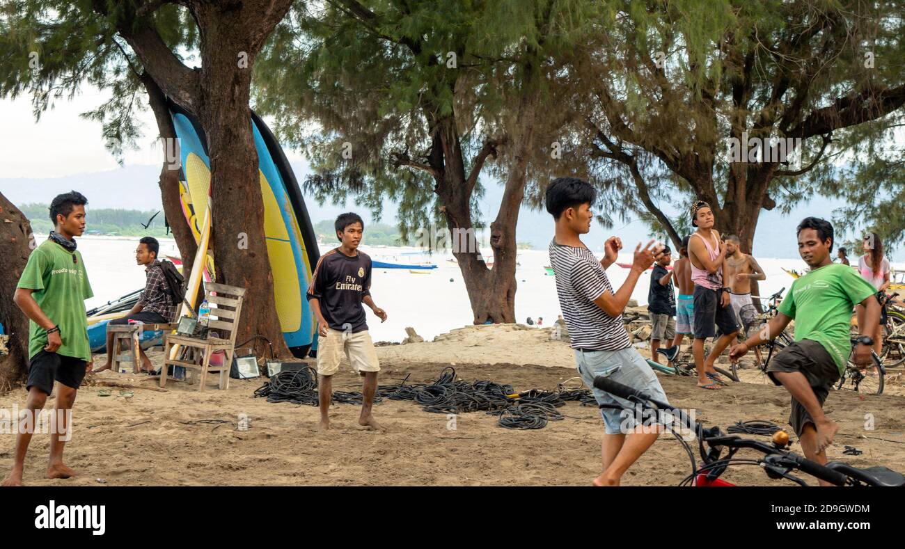 Indonesian guys playing football on the beach, Indonesia, Bali, Gili ...