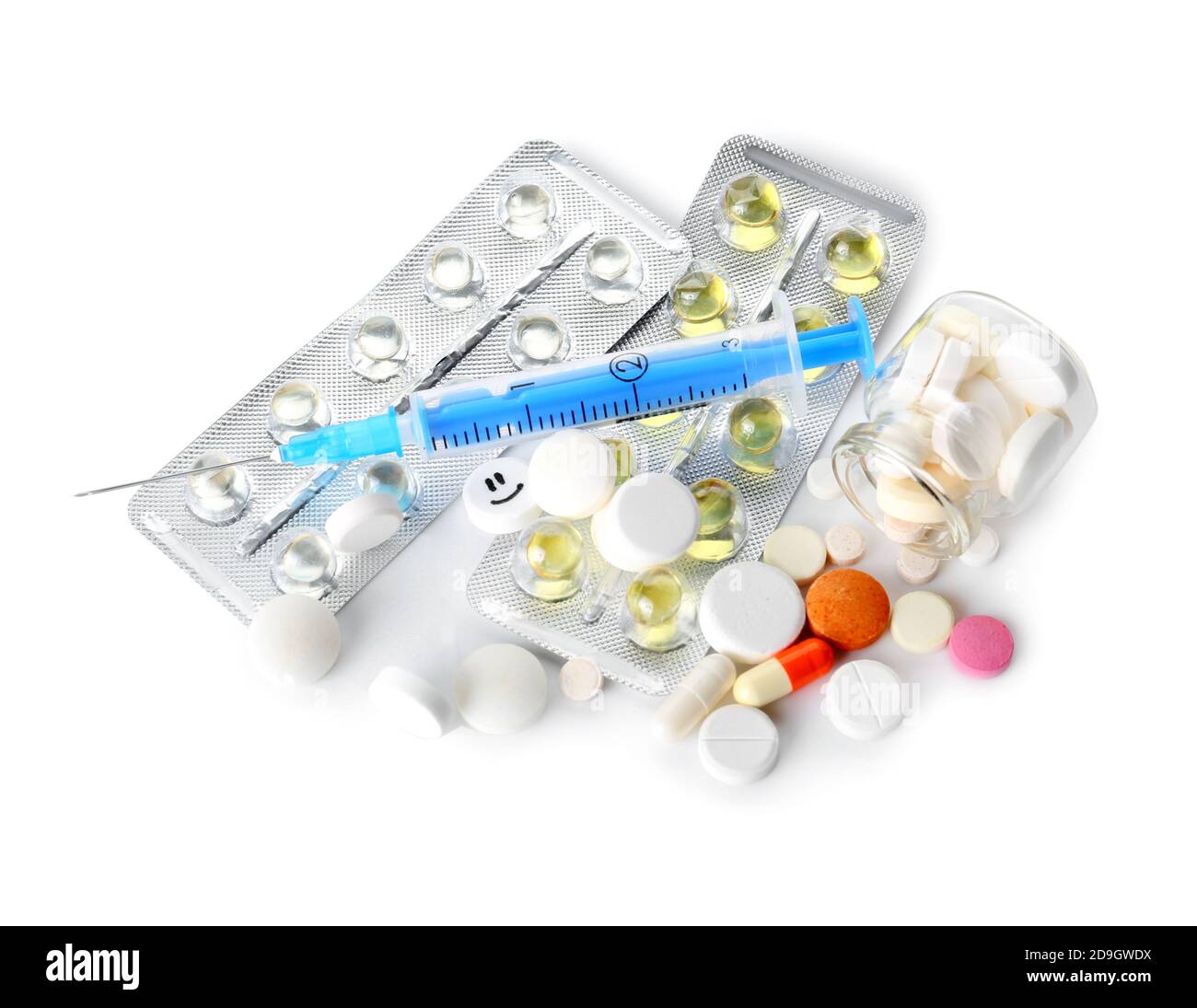 Pills and syringe for injection on white background Stock Photo - Alamy