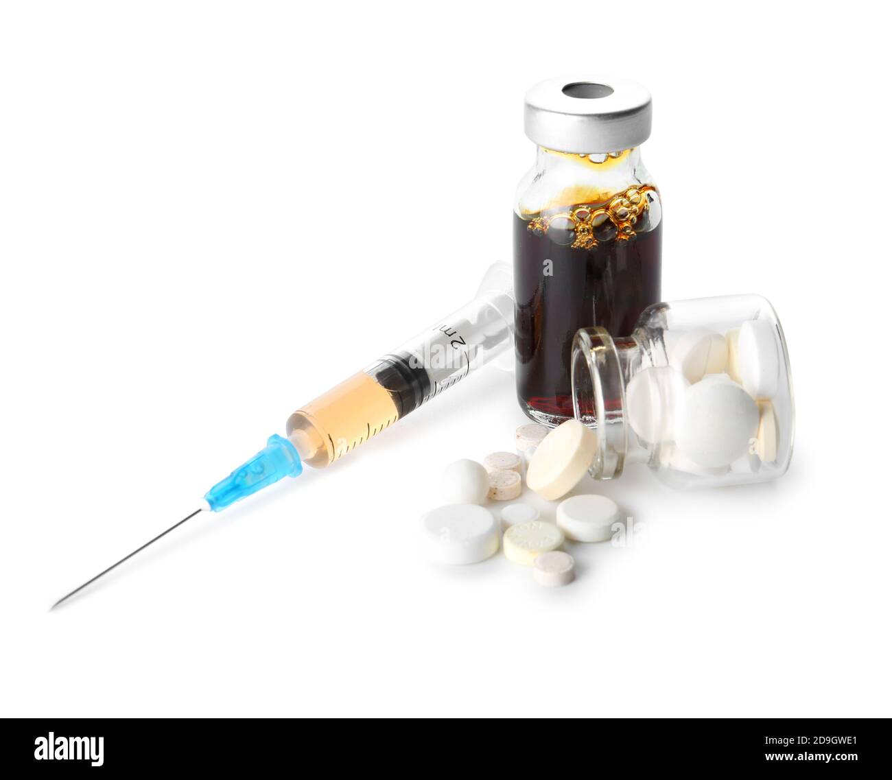 Drugs and syringe on white background Stock Photo - Alamy