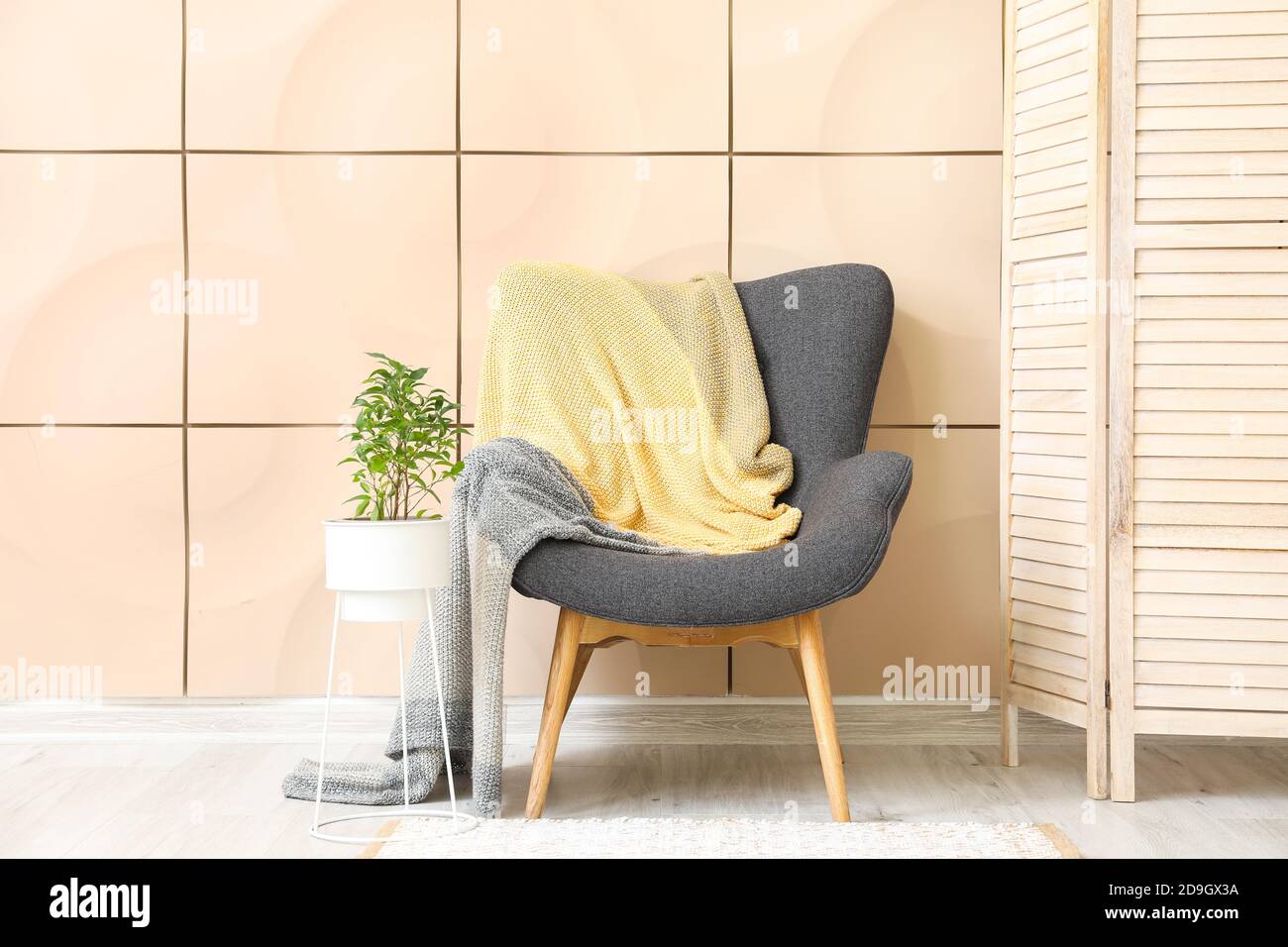 Interior of living room with cozy armchair Stock Photo - Alamy
