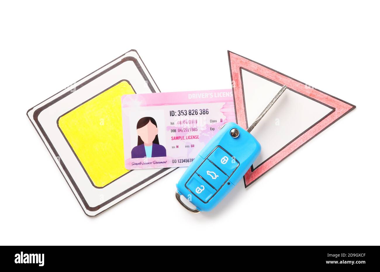 Driving license with car key and road signs on white background Stock ...