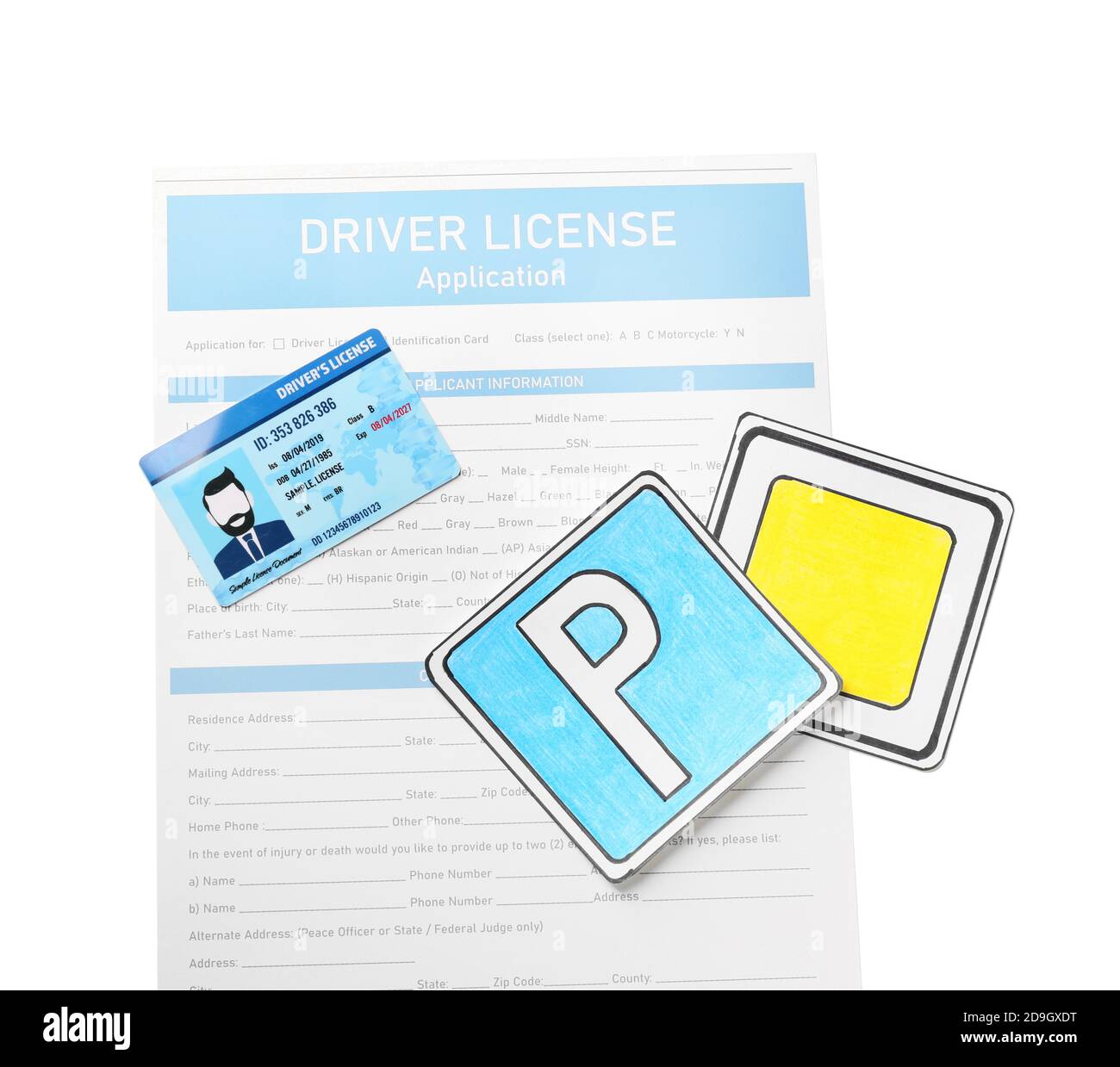 Driving license with application form and road signs on white ...