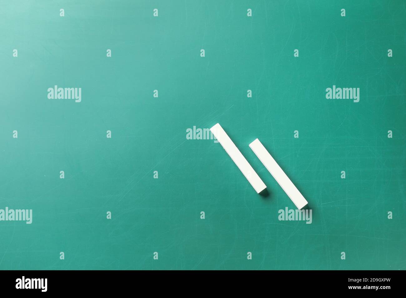 Pieces of chalk on blackboard, top view Stock Photo - Alamy