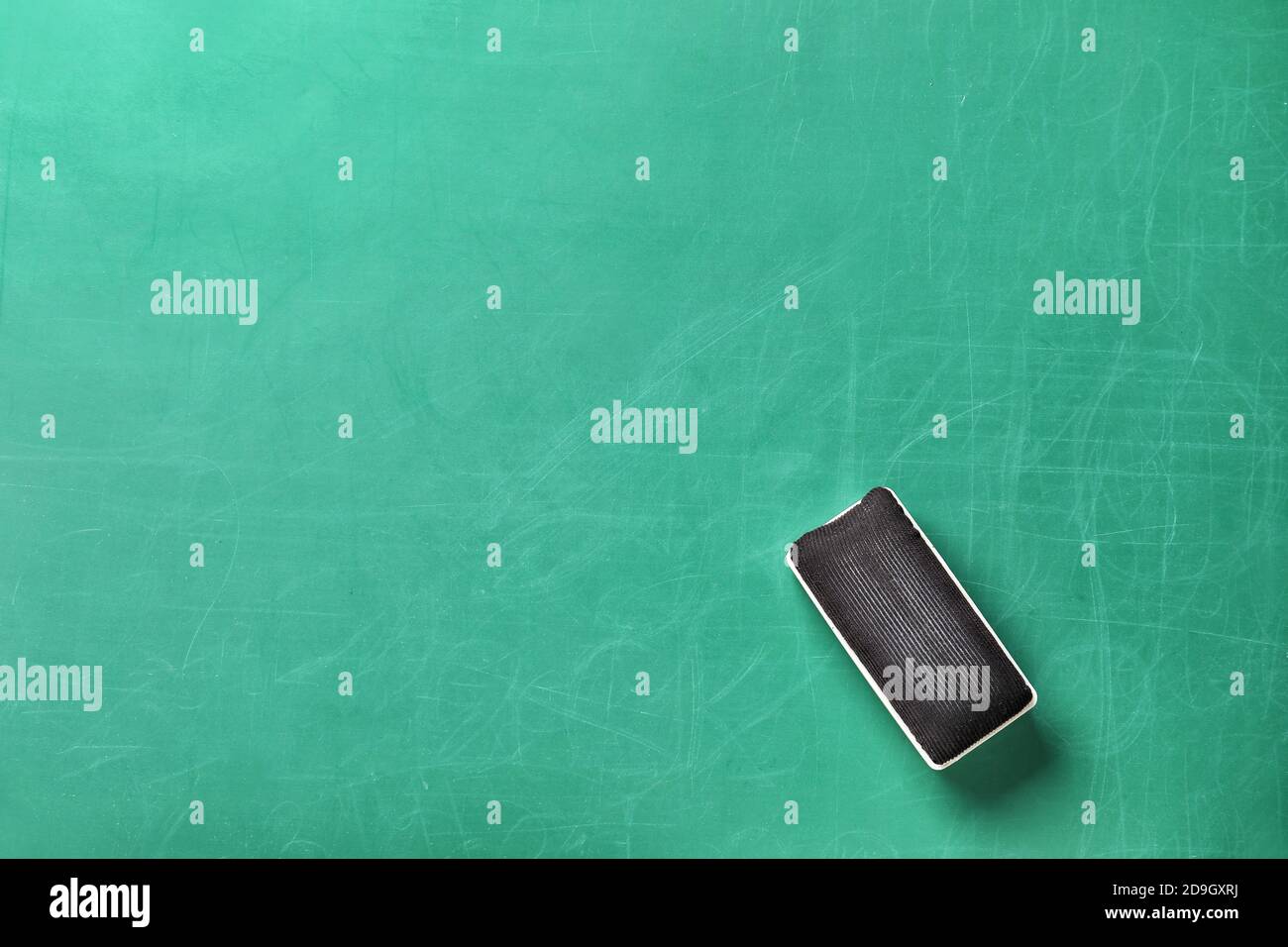 Sponge on chalkboard, top view Stock Photo - Alamy