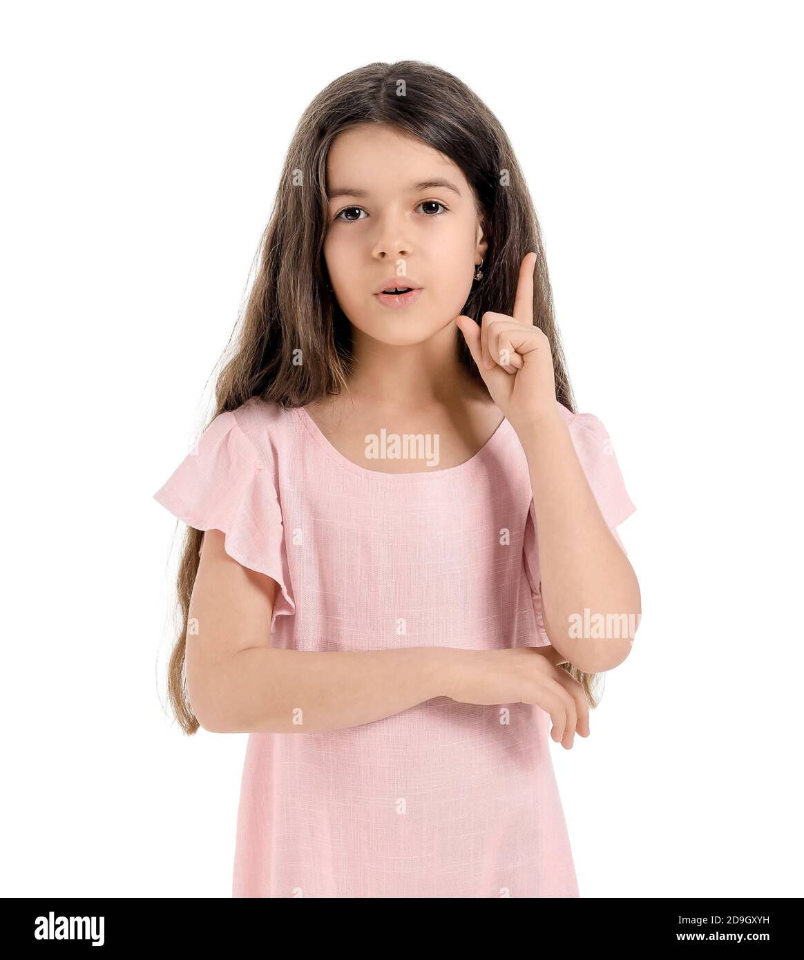 Cute little girl with raised index finger on white background Stock ...