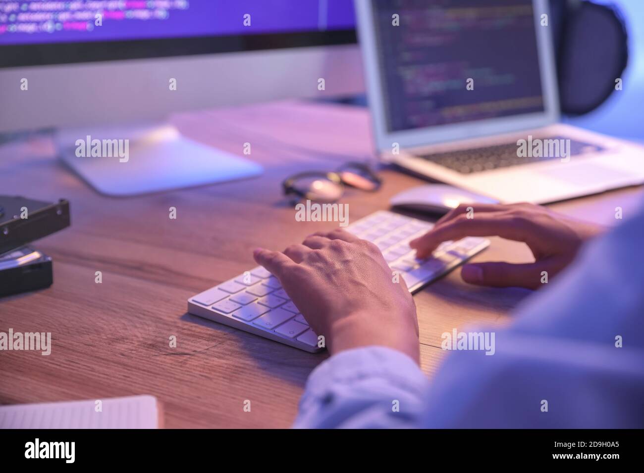 Female programmer working in office at night, closeup Stock Photo - Alamy