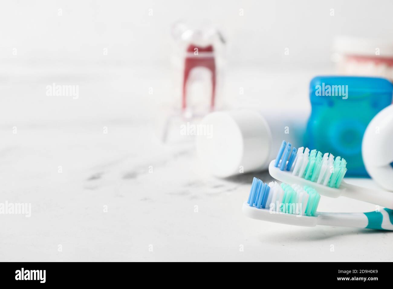 Set for oral hygiene on table Stock Photo - Alamy