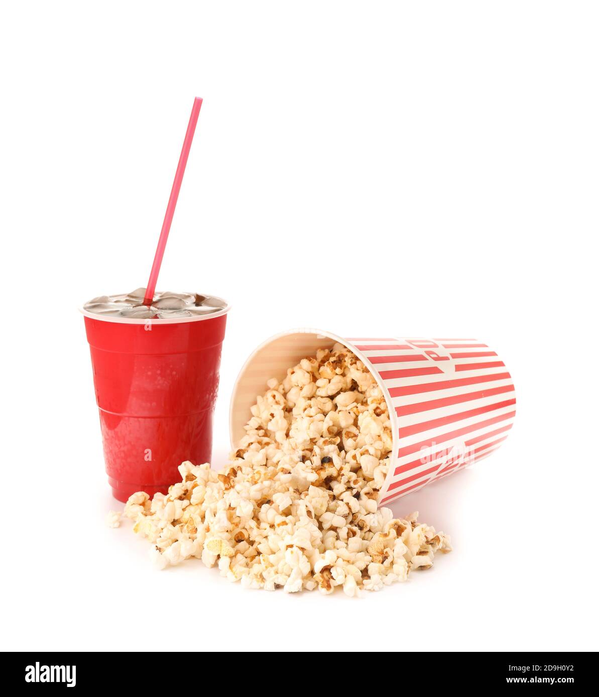 Tasty popcorn and cola on white background Stock Photo - Alamy