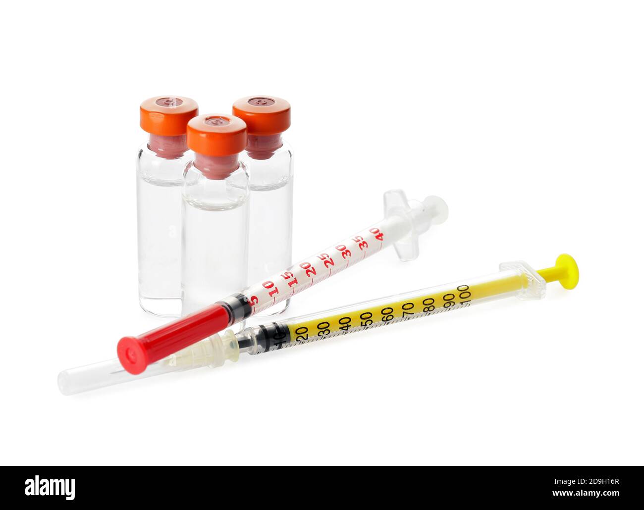 Bottles of insulin and syringes on white background. Diabetes concept ...