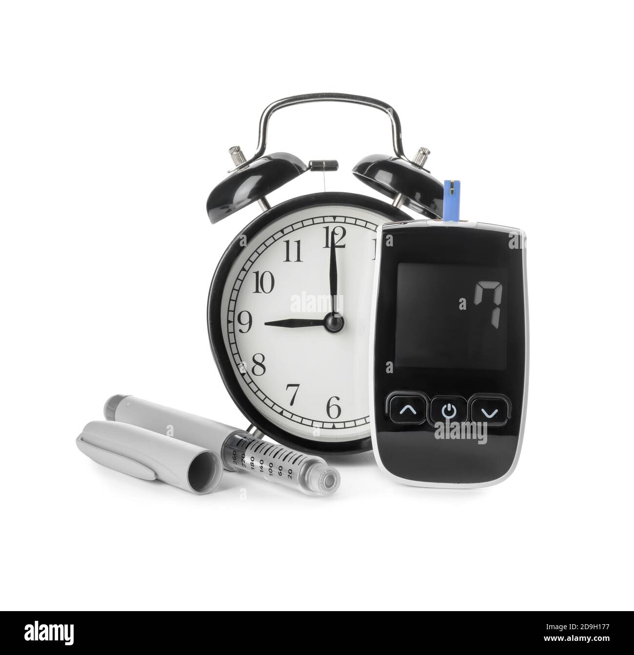 Glucometer, alarm clock and syringe on white background. Diabetes ...