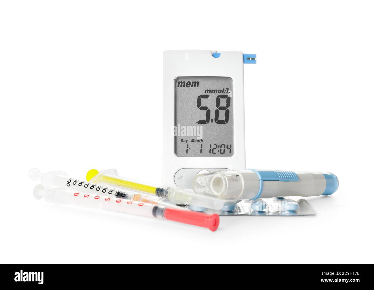 Glucometer, pills, lancet pen and syringes on white background ...