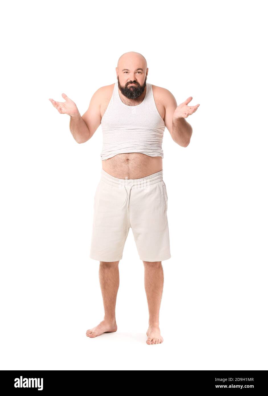 Confused overweight man on white background. Weight loss concept Stock ...