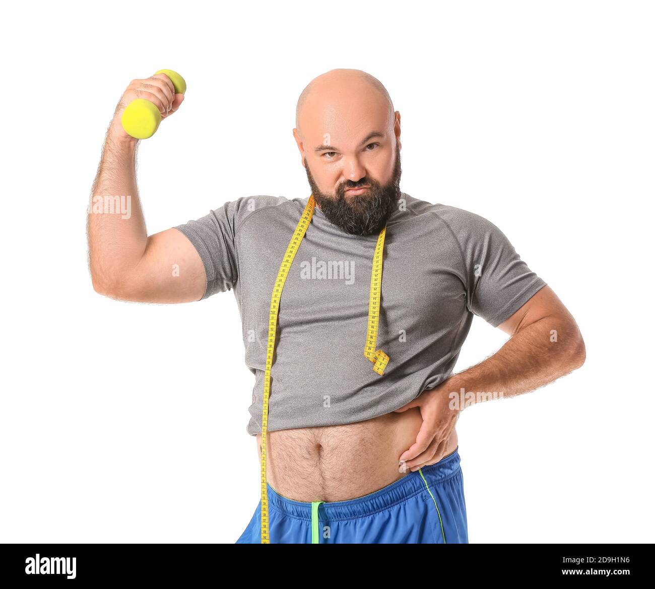 Overweight man with measuring tape and dumbbell on white background ...