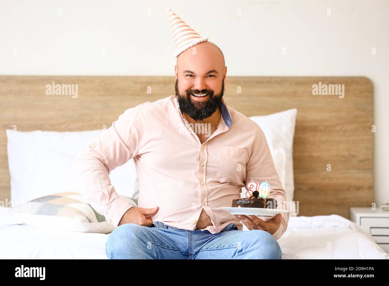 Fat man sitting bed hi-res stock photography and images - Alamy