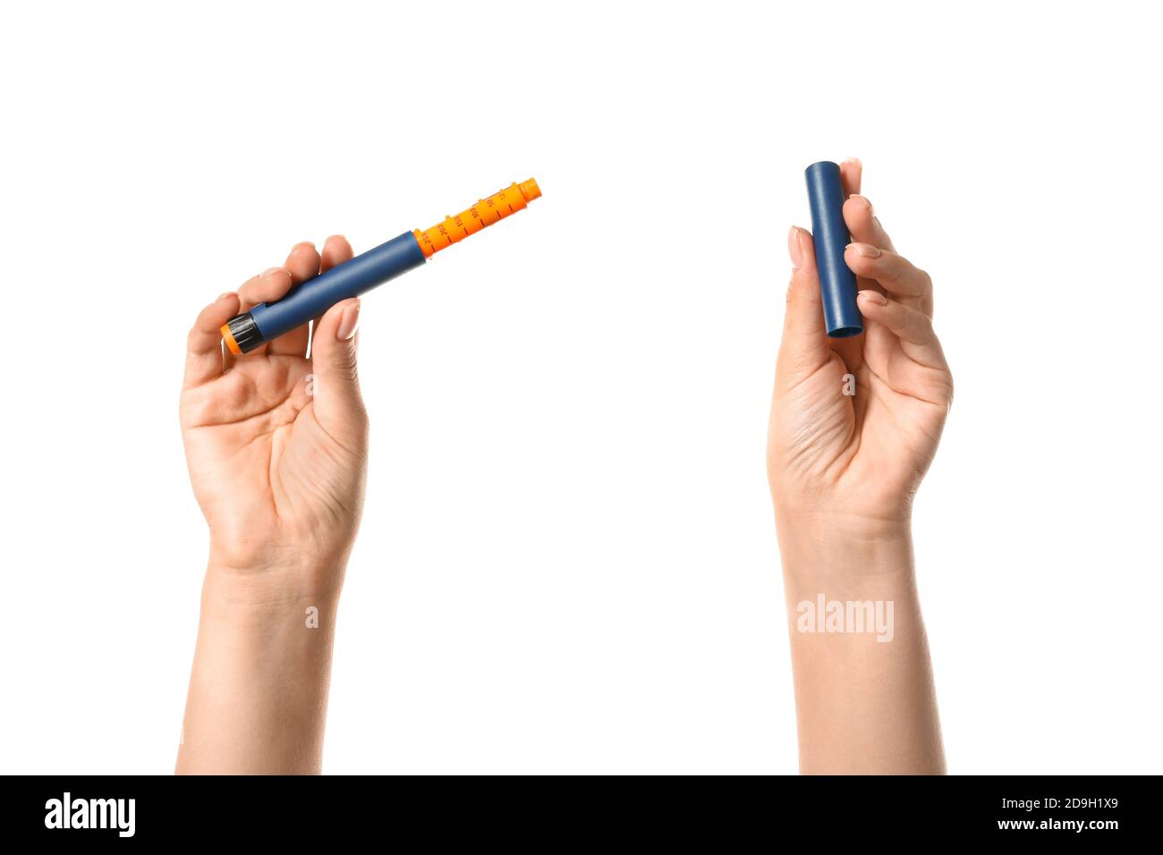 Female hands with syringe for insulin injection on white background ...