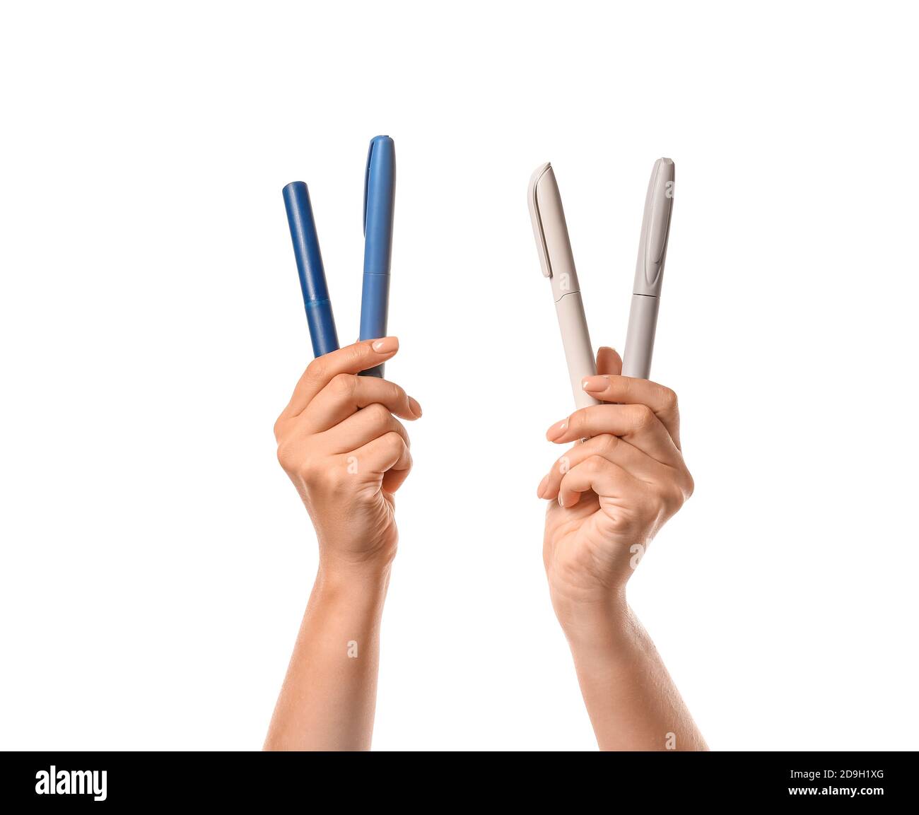 Female hands with syringes for insulin injection on white background ...