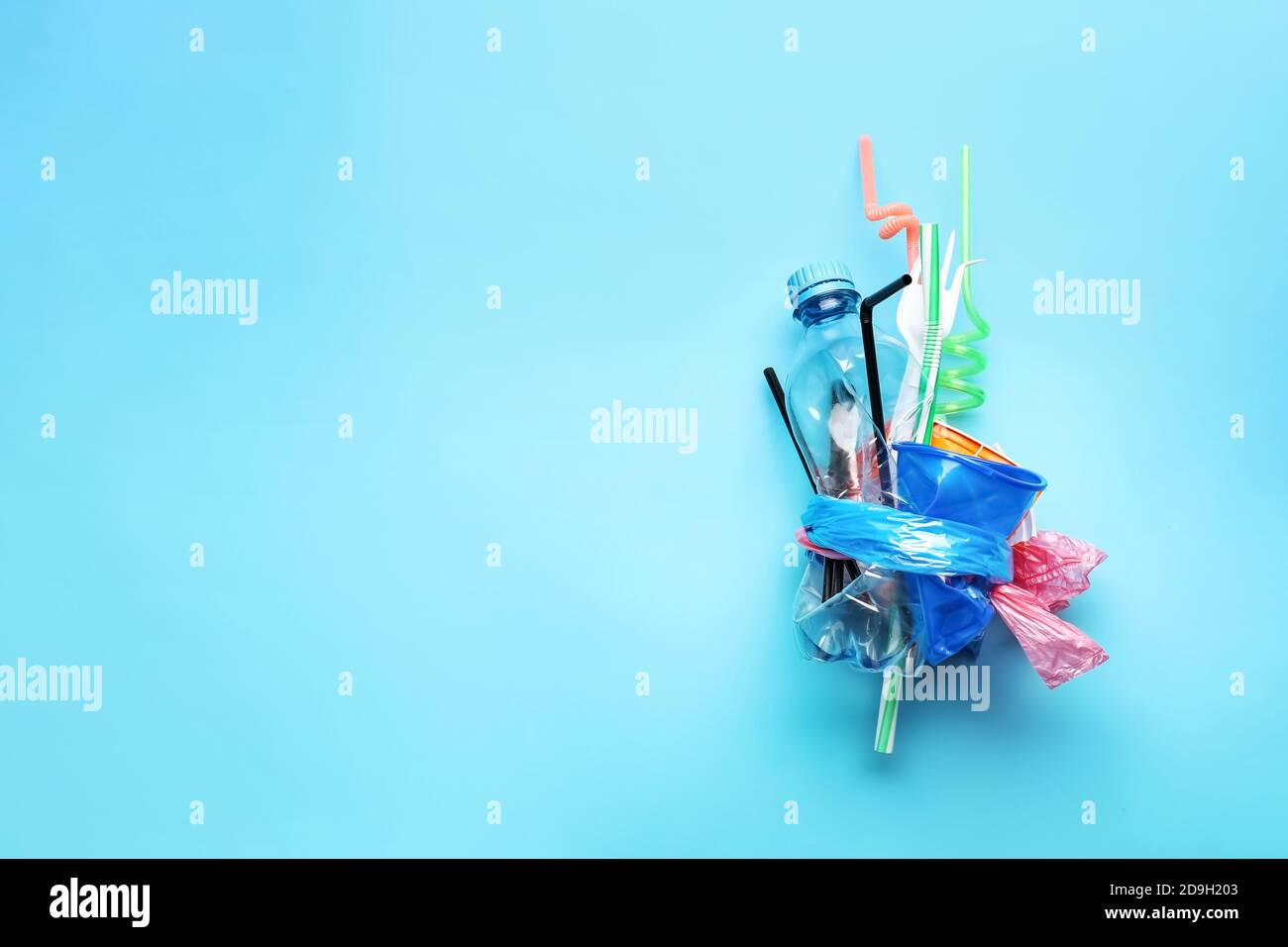 Plastic garbage on color background. Ecology concept Stock Photo - Alamy