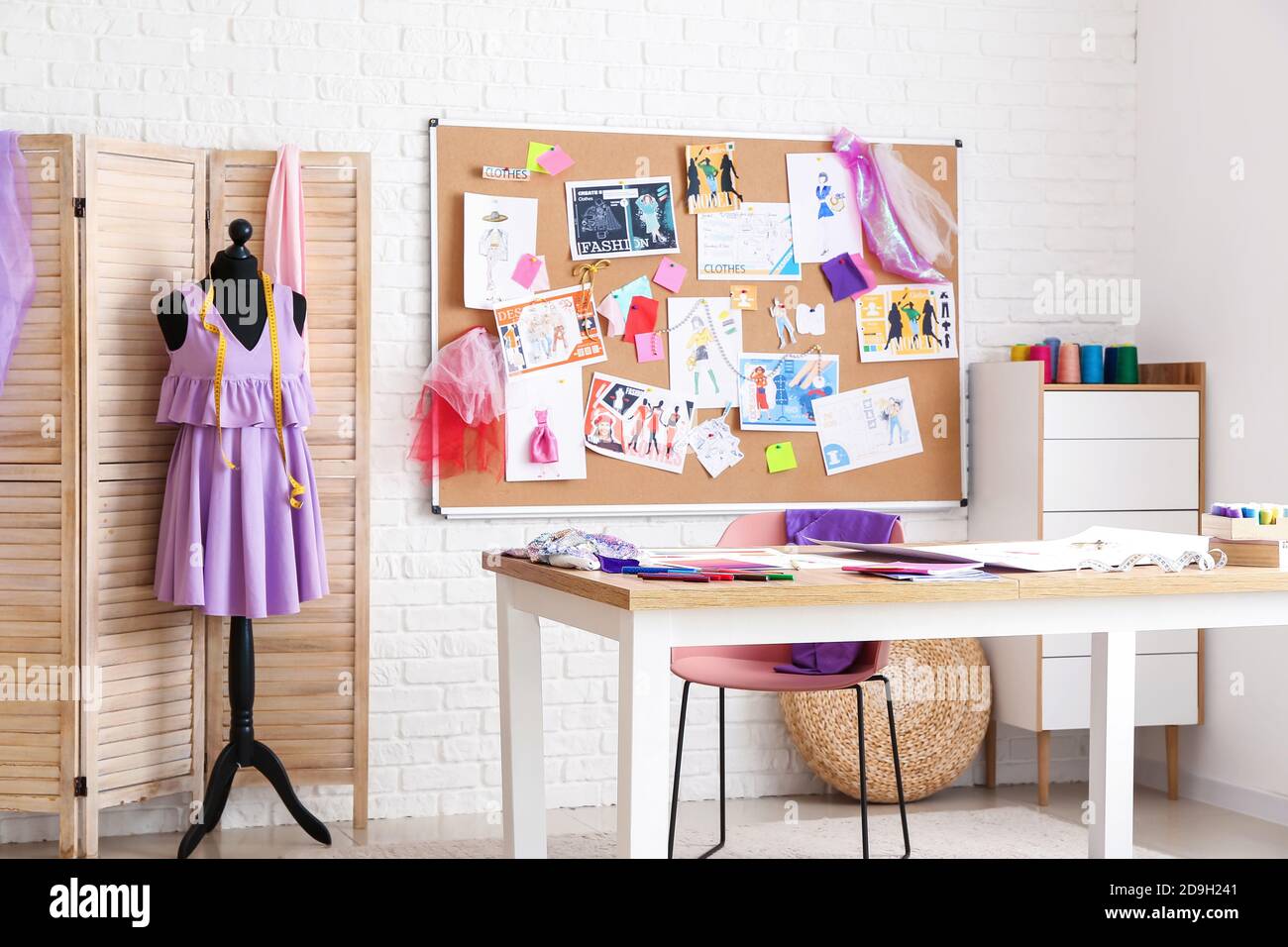 Workplace in studio of fashion designer Stock Photo - Alamy