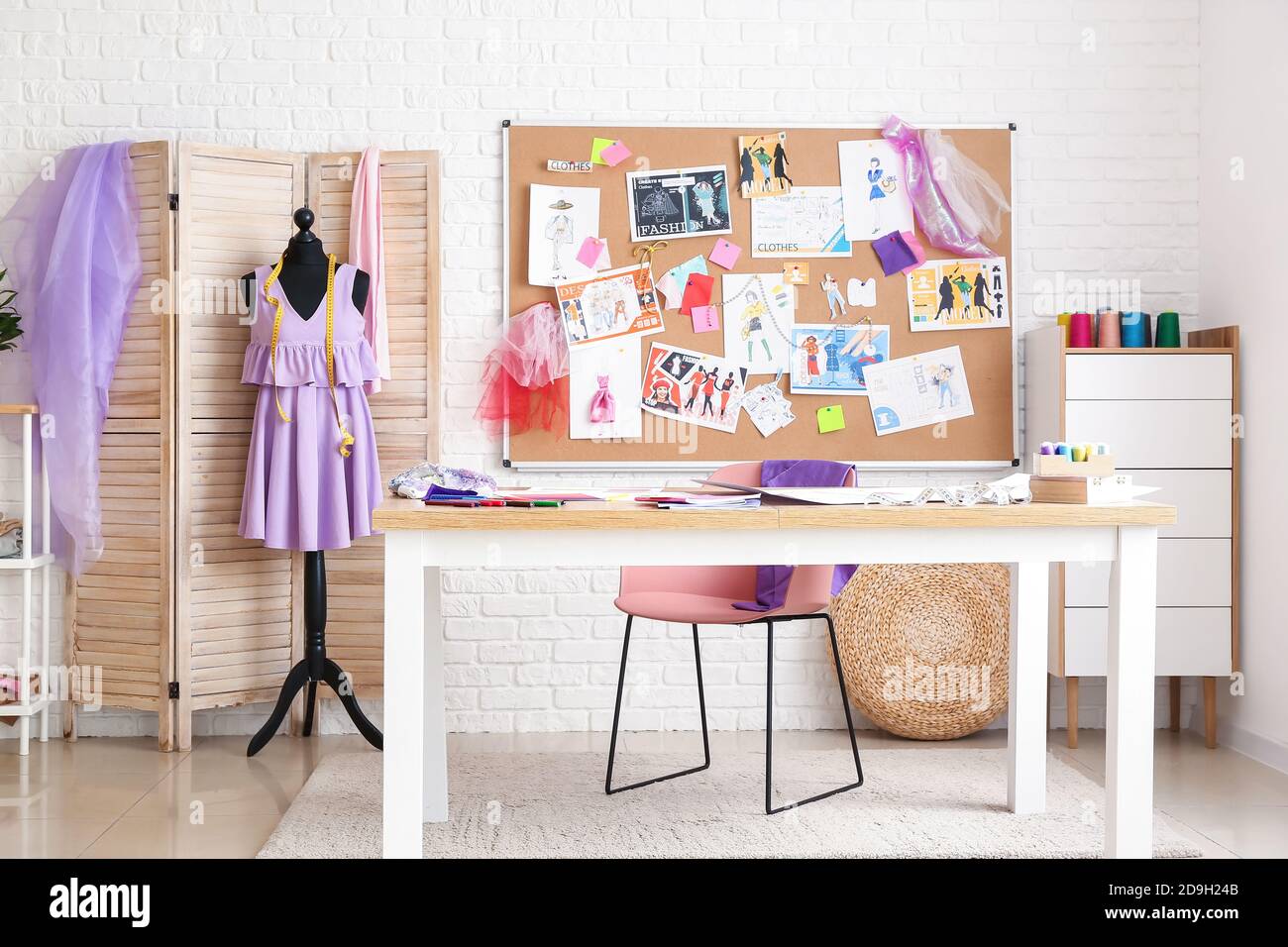 Workplace in studio of fashion designer Stock Photo - Alamy