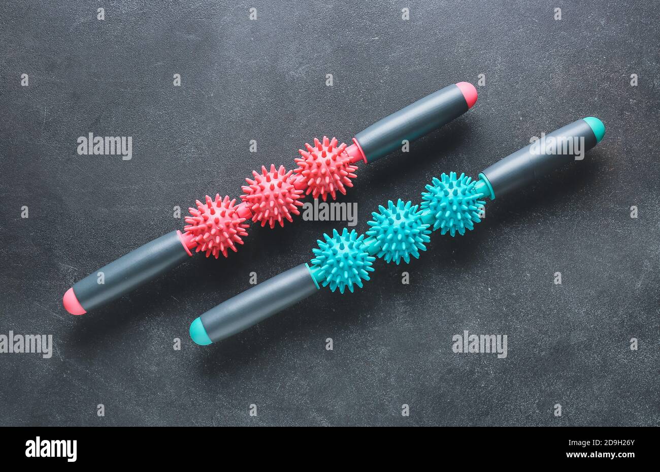 Body rollers on dark background Stock Photo - Alamy