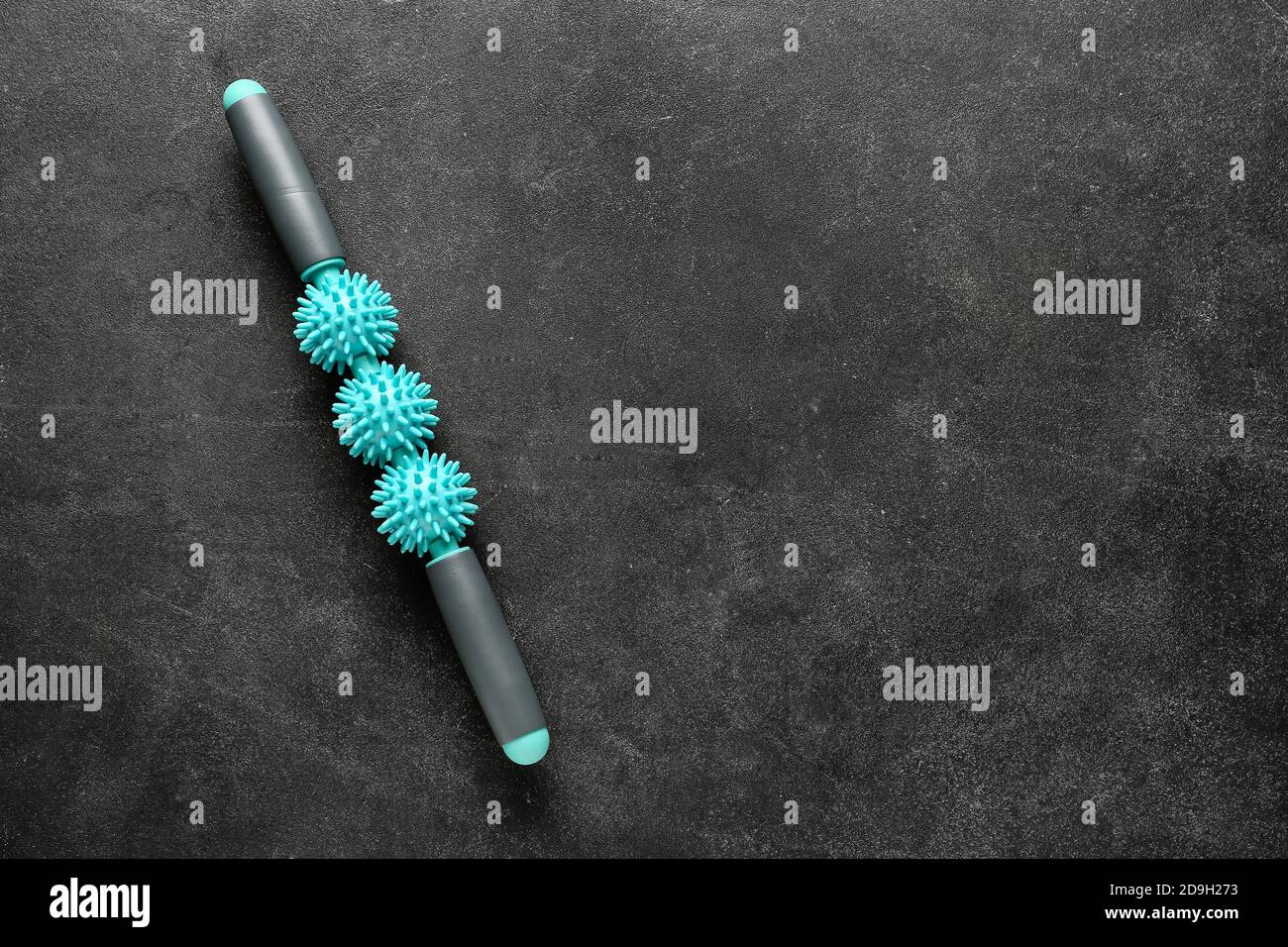 Body roller on dark background Stock Photo - Alamy