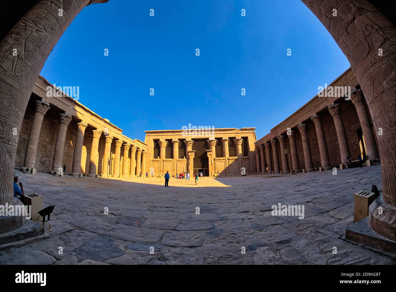 The rear walls of the colonnade are covered with three rows of large ...