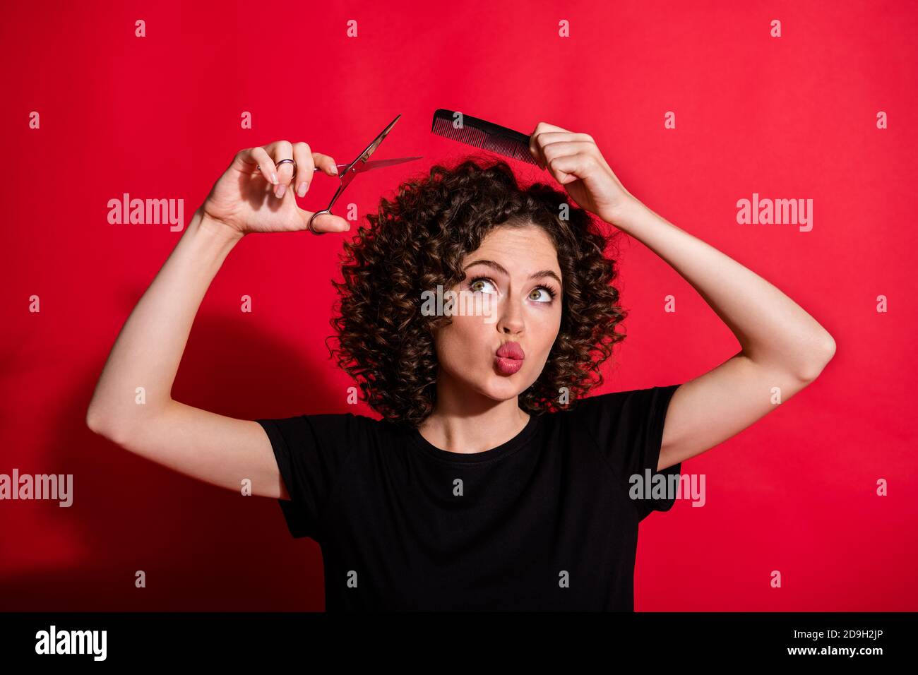 Photo of nice young person hold scissors brush look empty space ...