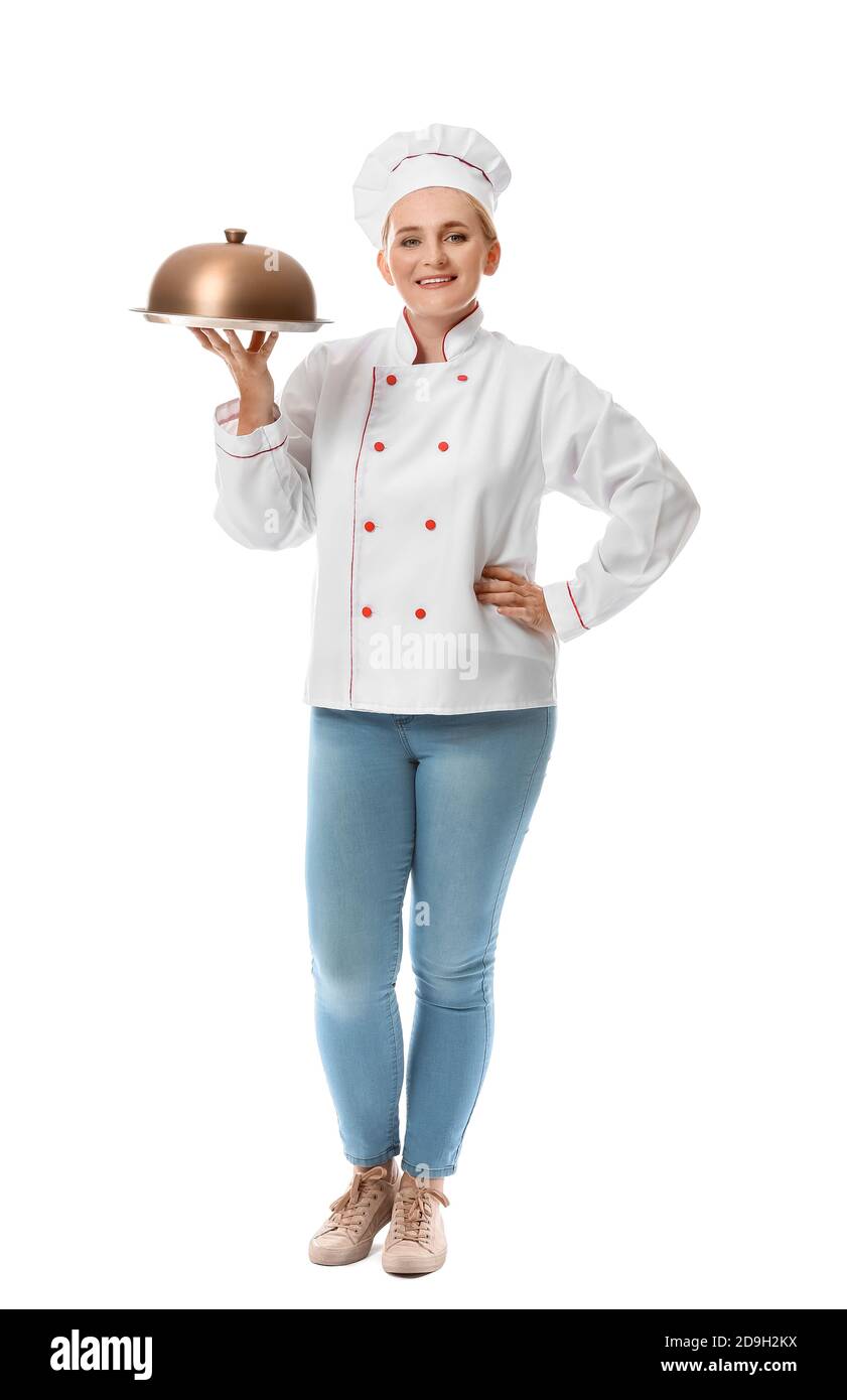 Mature female chef with tray and cloche on white background Stock Photo ...