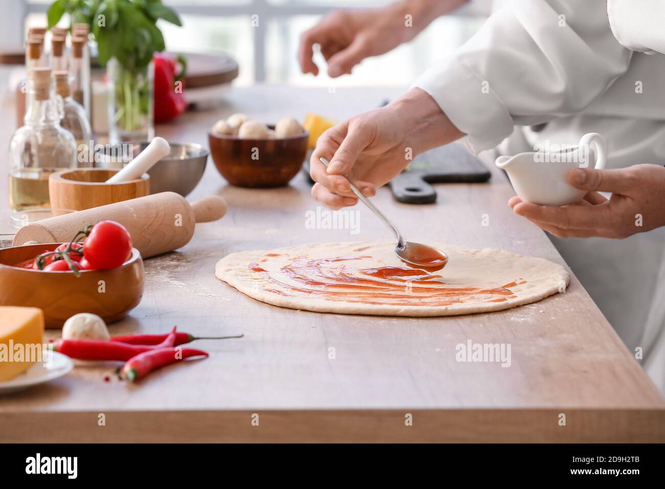 Chefs cooking tasty pizza hi-res stock photography and images - Alamy