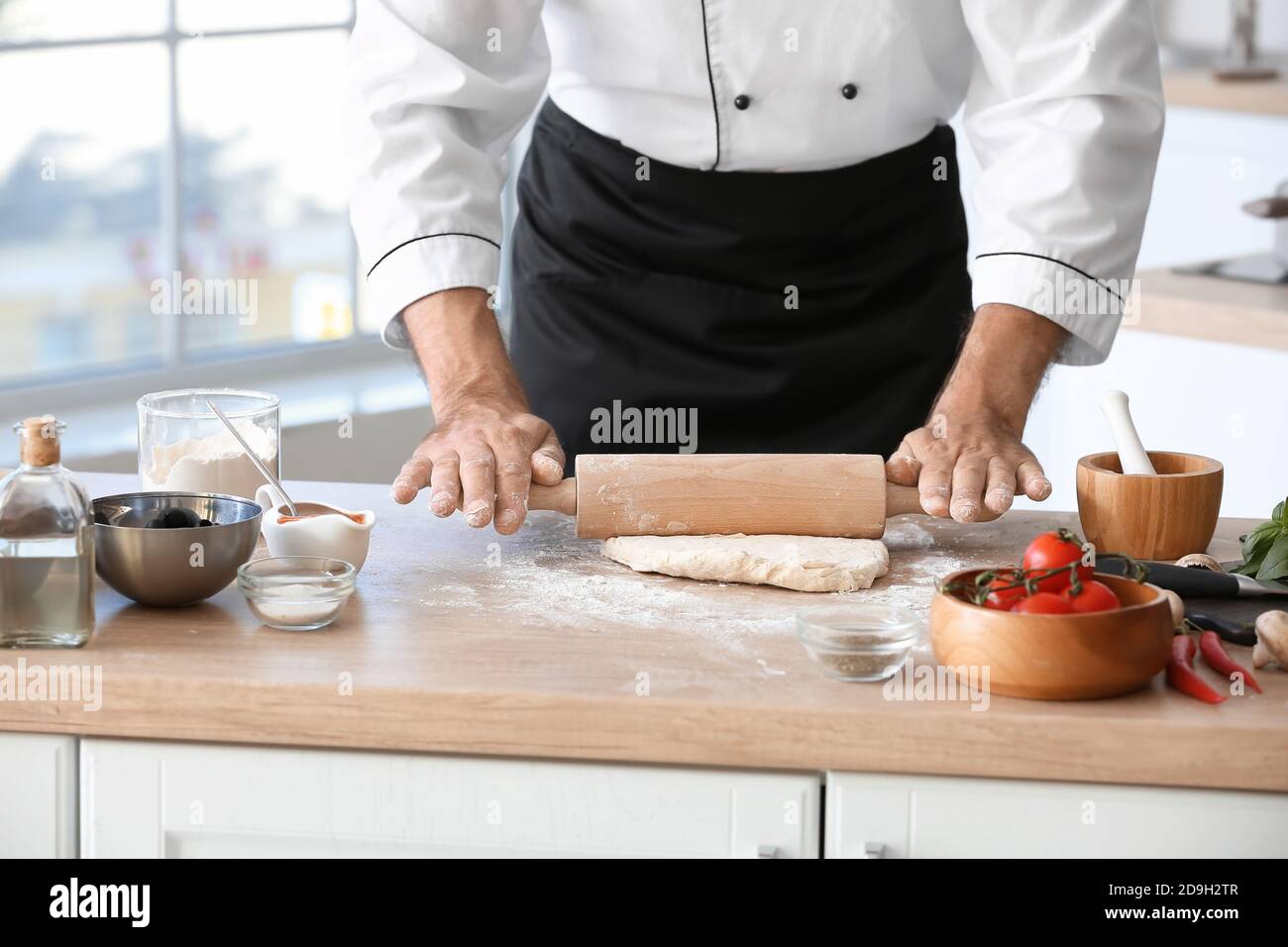 Mature male chef making hi-res stock photography and images - Alamy