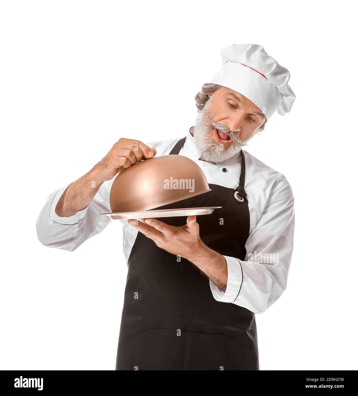 Mature male chef with tray and cloche on white background Stock Photo ...