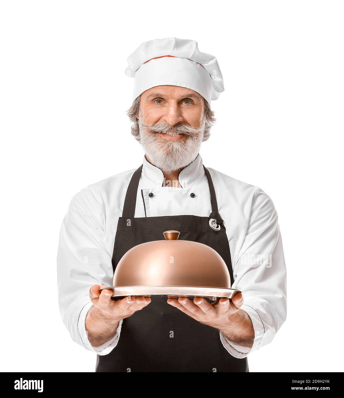 Mature male chef with tray and cloche on white background Stock Photo ...