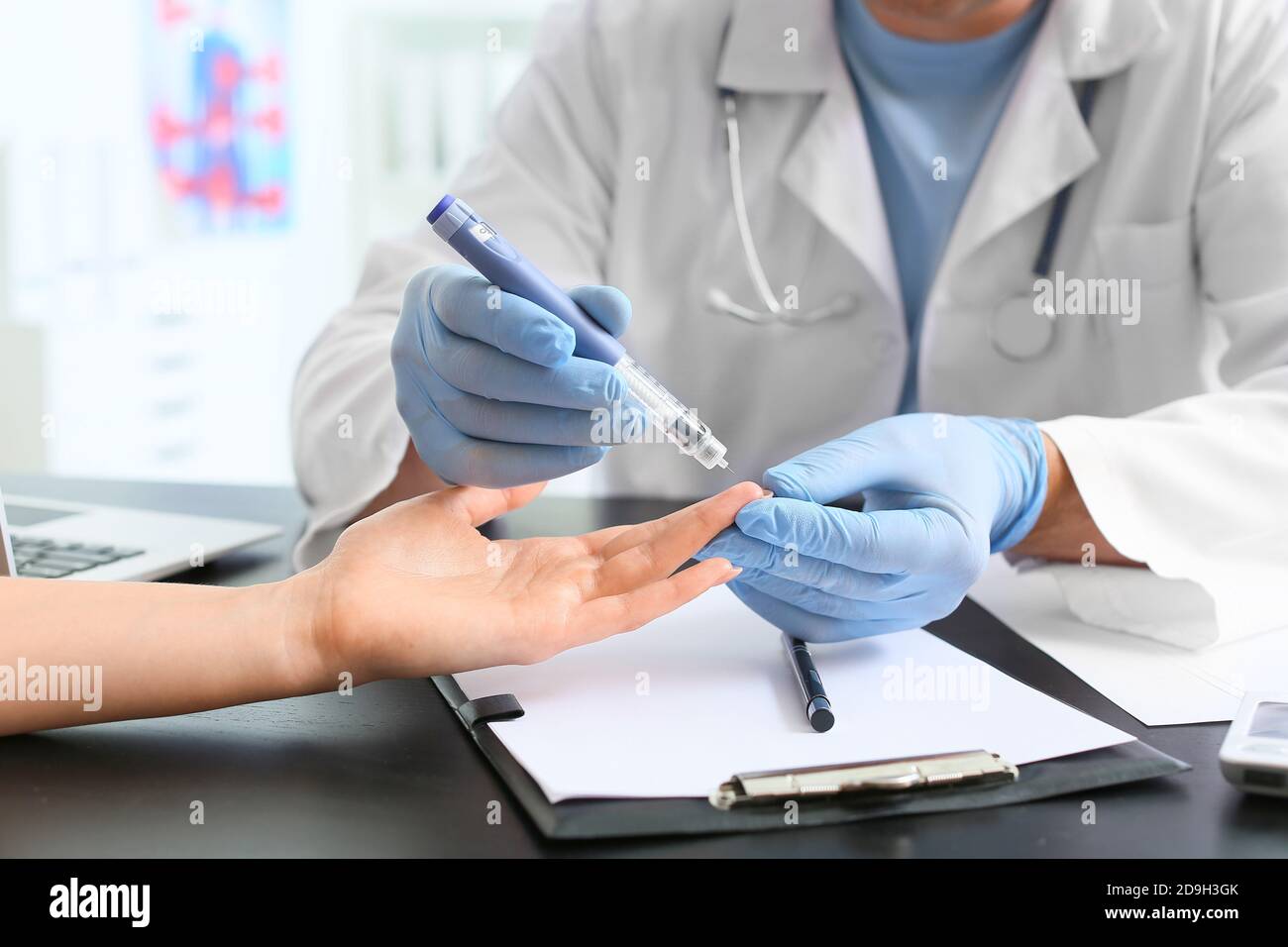Pregnant diabetic woman visiting doctor in clinic Stock Photo - Alamy