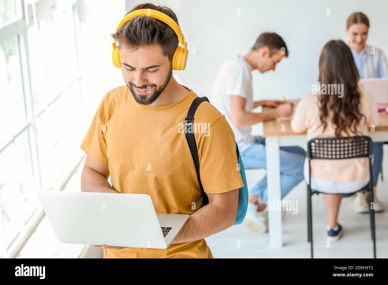 Students with modern devices studying online indoors Stock Photo - Alamy