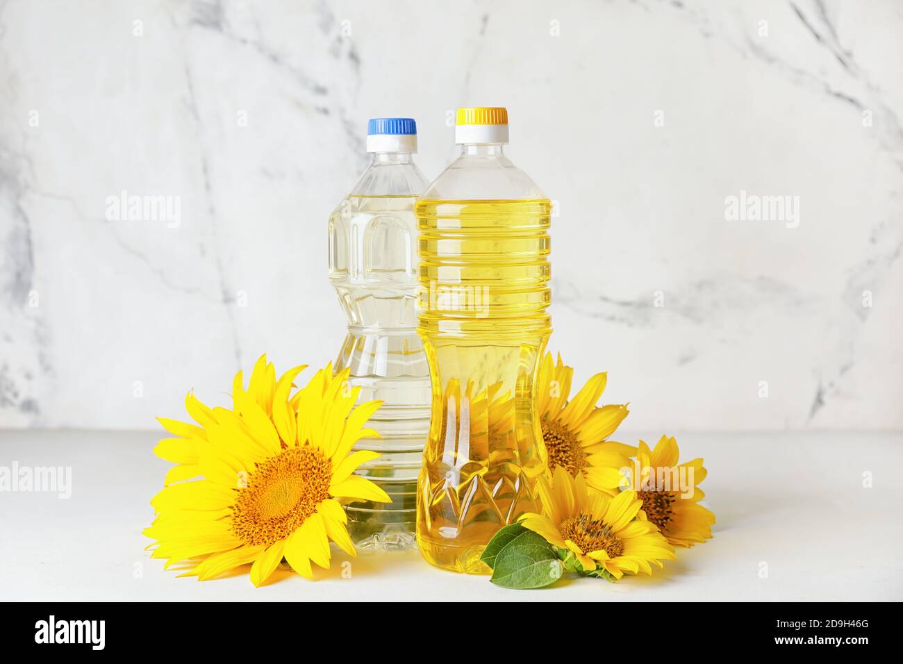 Composition with sunflower oil on table Stock Photo - Alamy