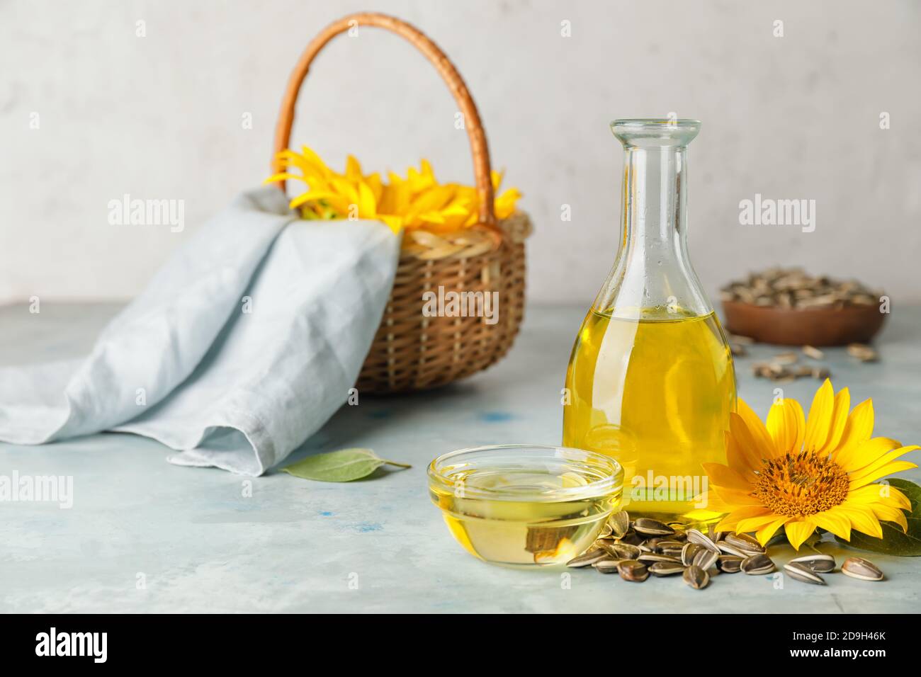 Composition with sunflower oil on table Stock Photo - Alamy