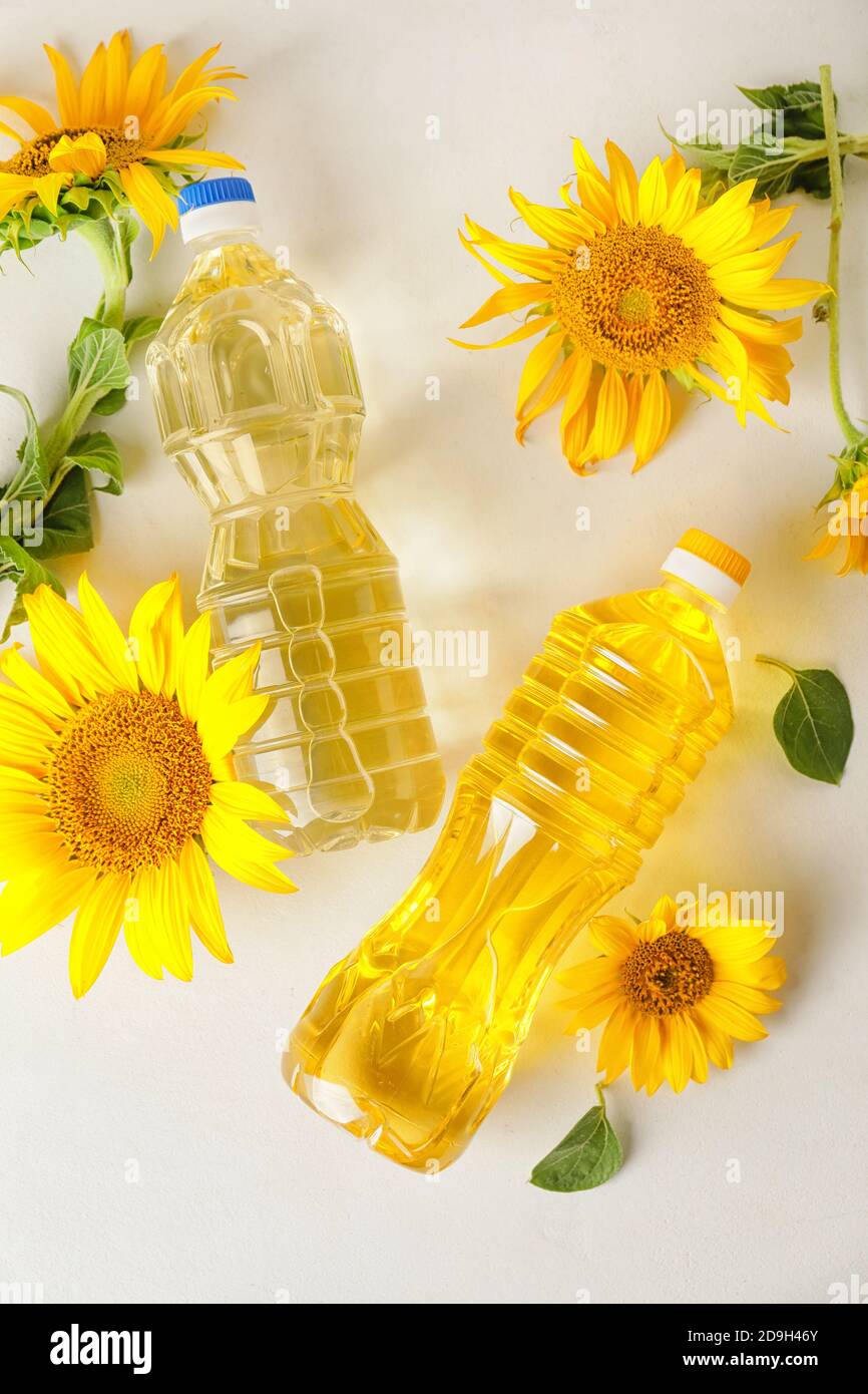 Composition with sunflower oil on table Stock Photo - Alamy